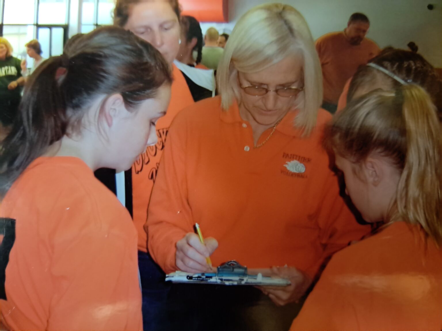 Women of Note: Booster, Lion, coach, board member: Lyn St. Dennis wears ...